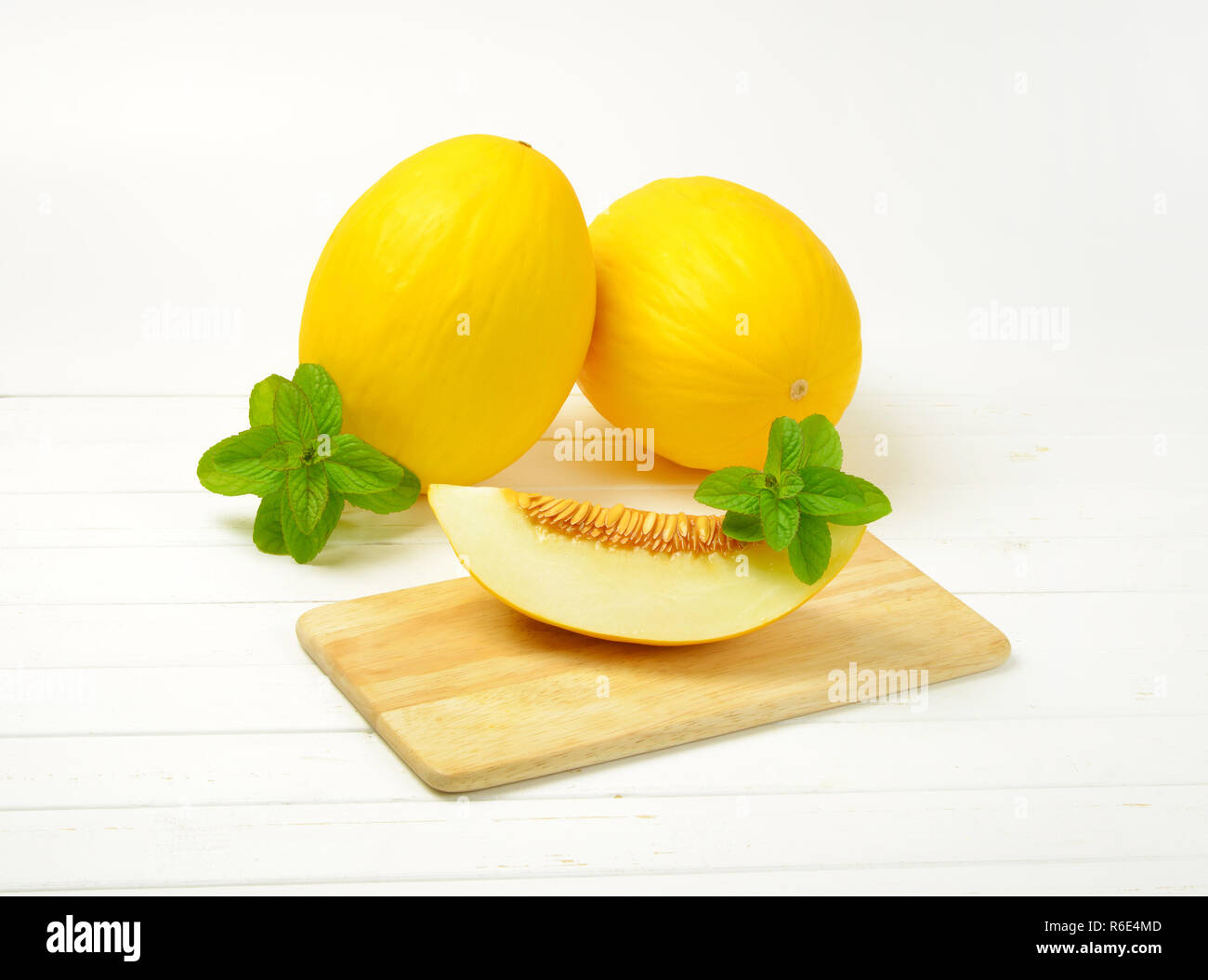 Cutting melons hi-res stock photography and images - Alamy