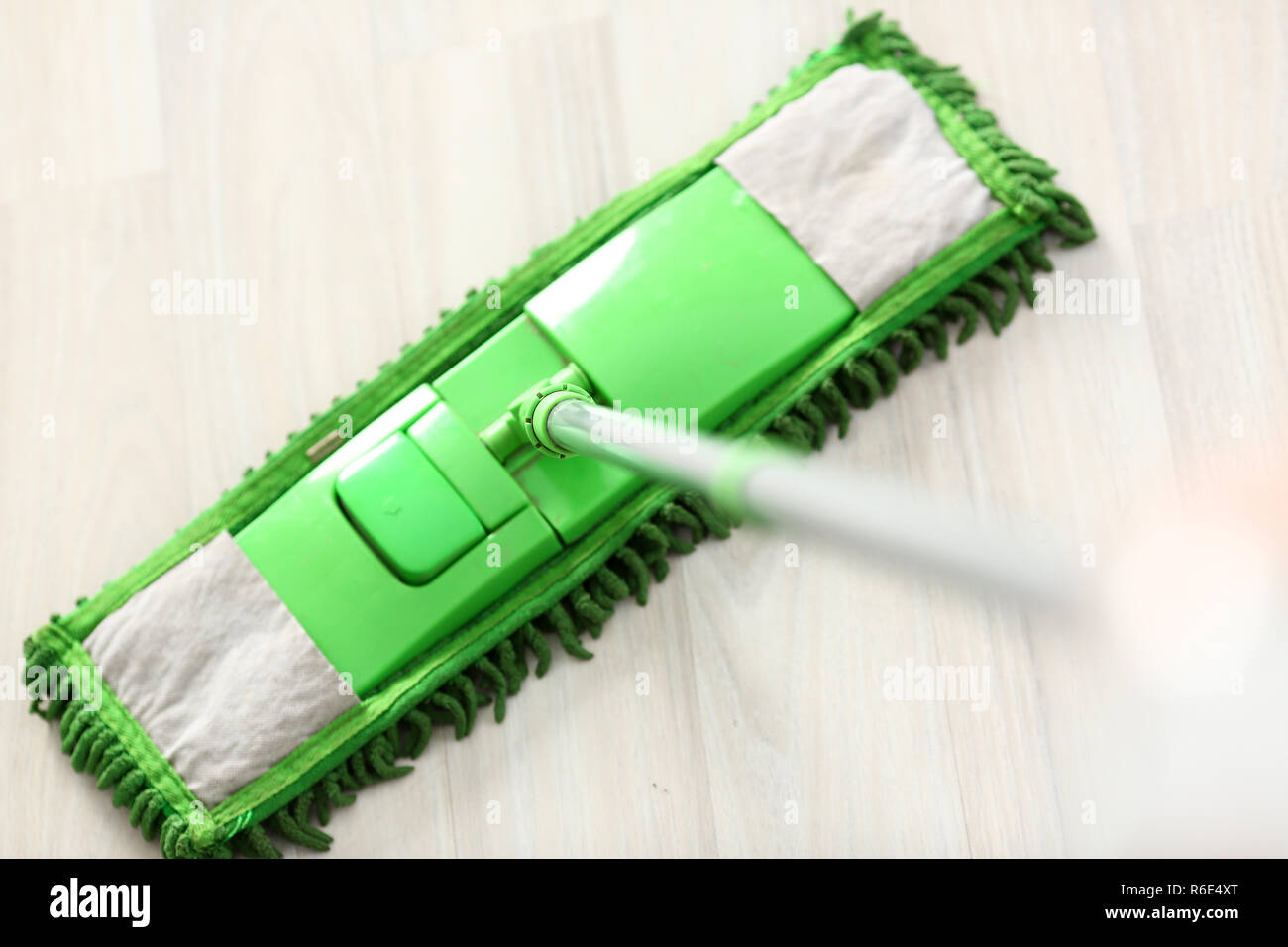 Green plastic mop Stock Photo - Alamy