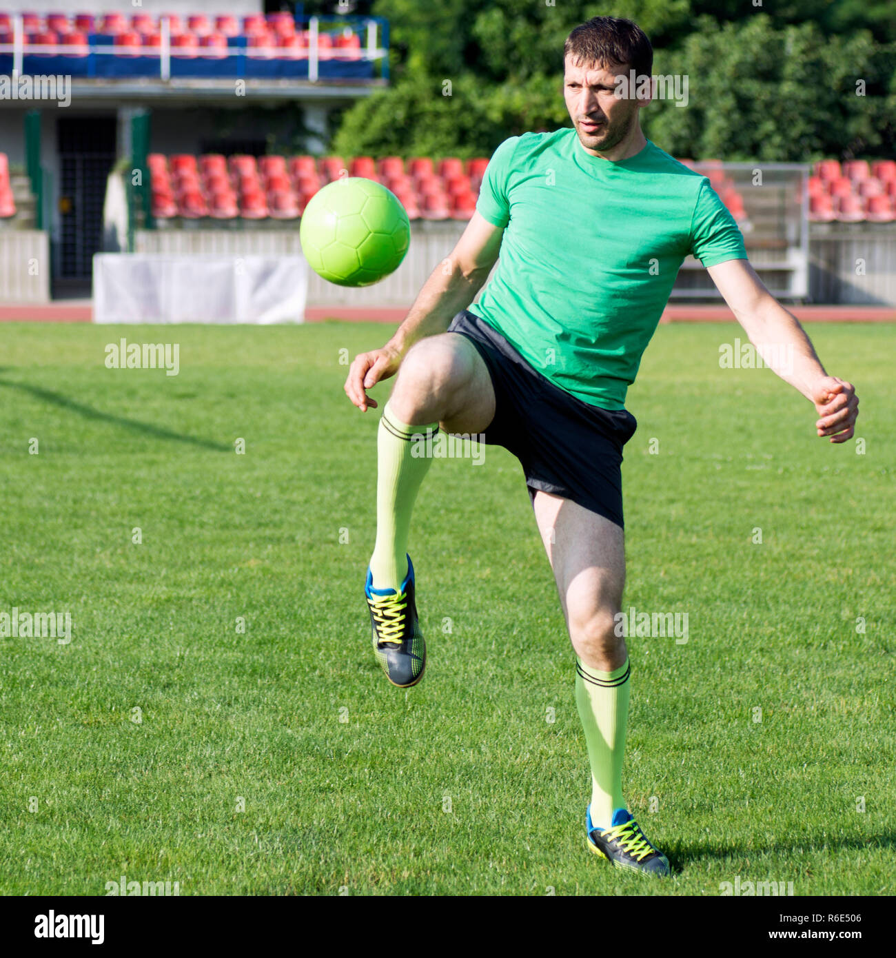 shooting soccer ball Stock Photo - Alamy