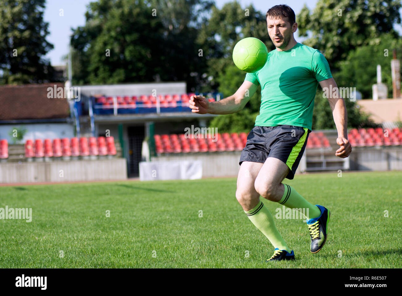 shooting soccer ball Stock Photo - Alamy