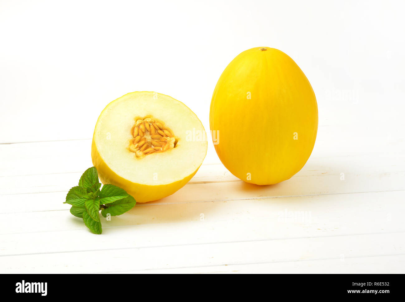 one and half yellow melons Stock Photo - Alamy