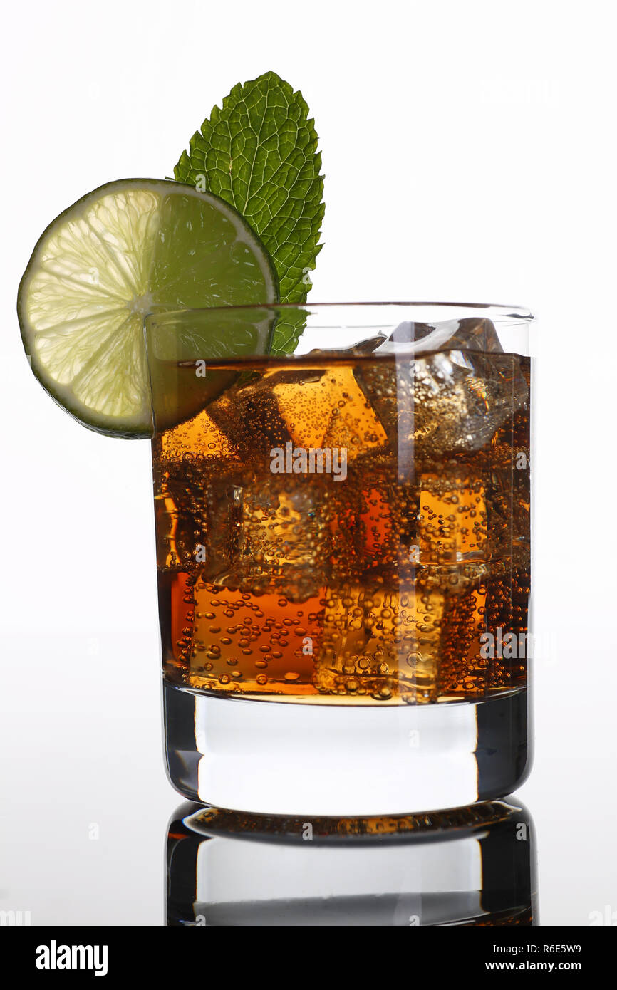 cocktail with cola and mint Stock Photo - Alamy