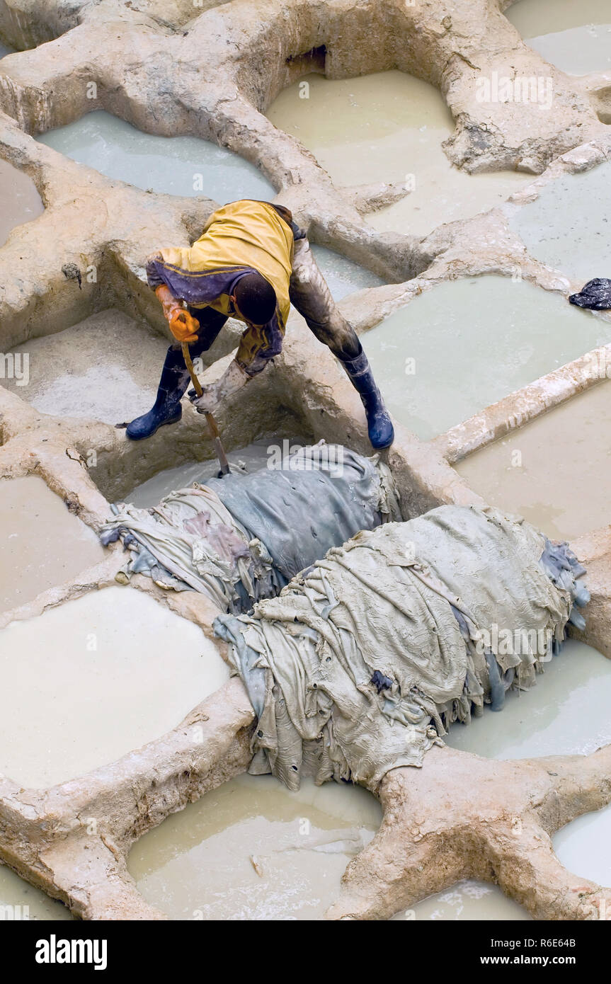Man Working As A Tanner In The Dye Pots At Leather Tanneries Viewed ...
