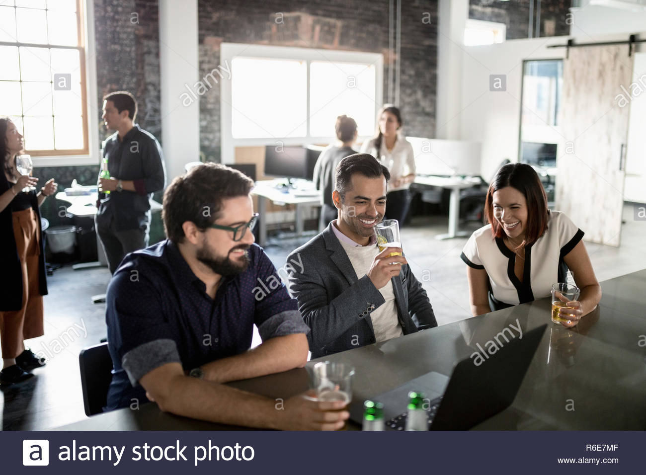 Business people laughing in a meeting hi-res stock photography and ...