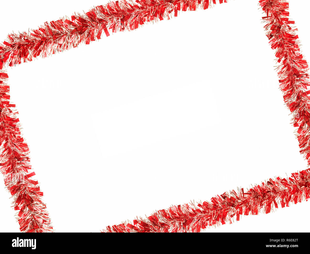 Red and silver tinsel frame isolated on white with copy space ...