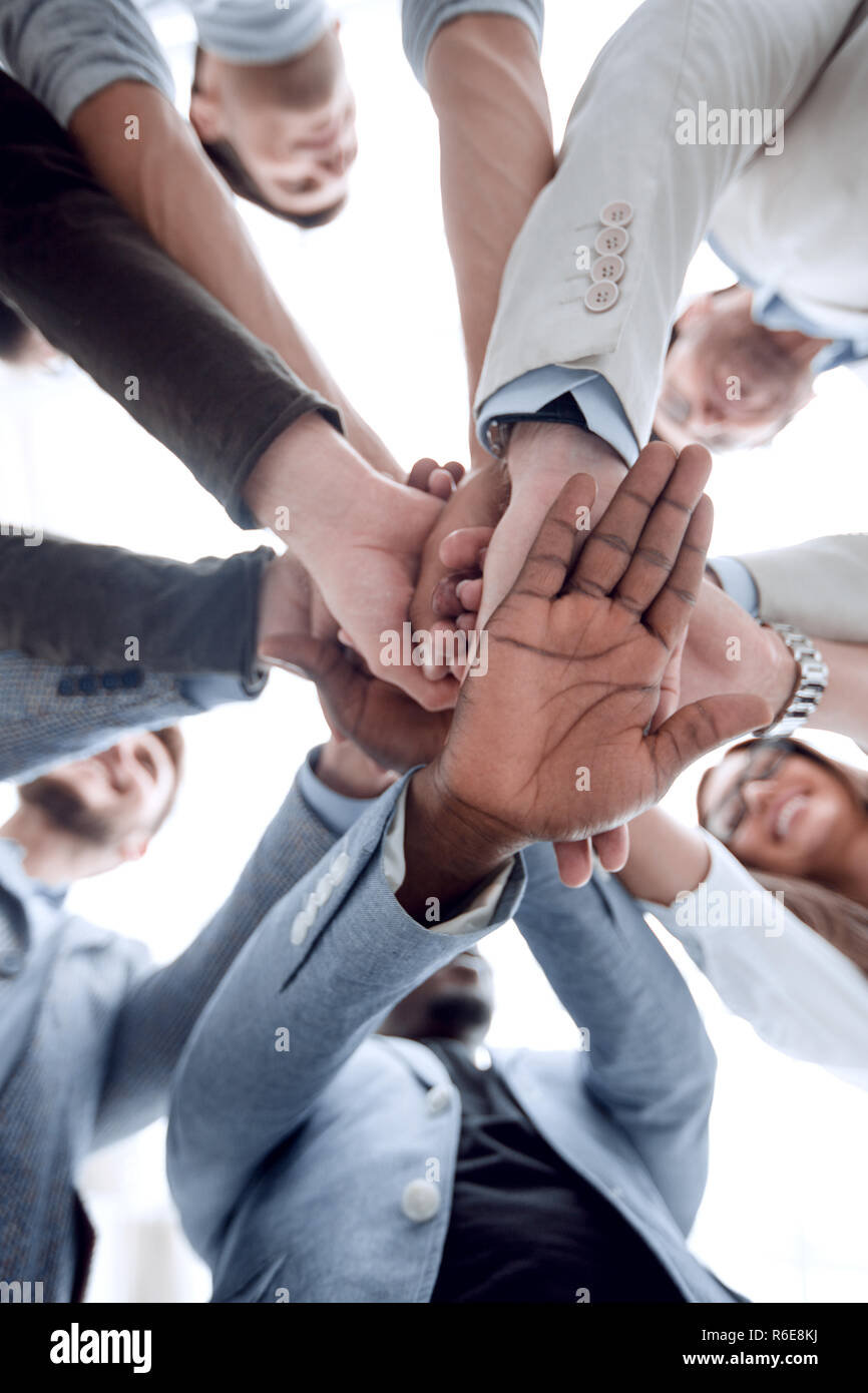 business background.business team making a stack of hands Stock Photo ...