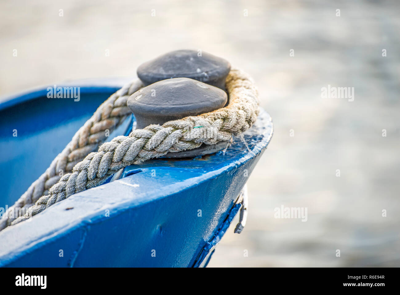 Ship Bow With Mooring Lines In An Harbor Stock Photo - Alamy