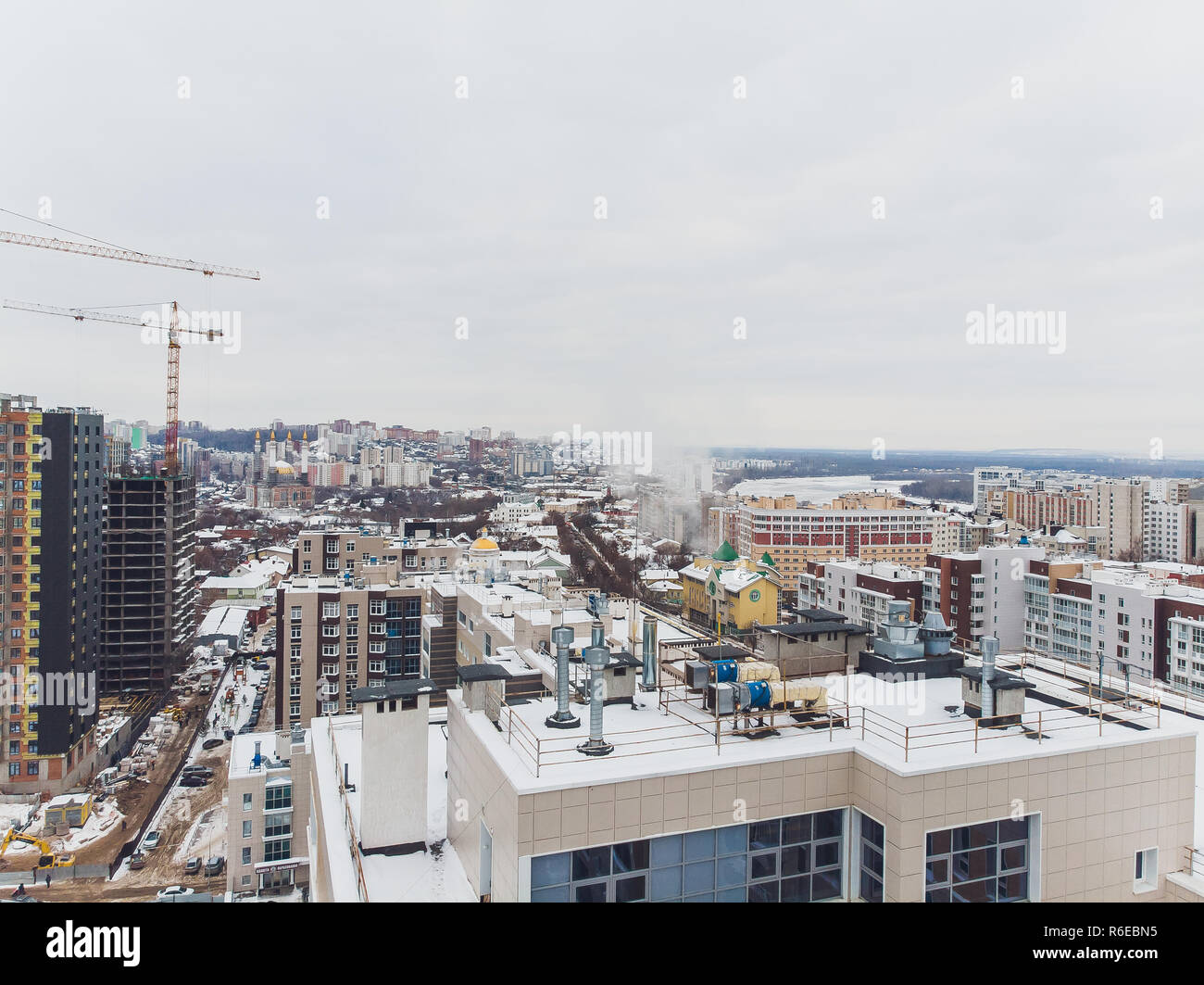 Snow covered city town and village houses in daylight with fresh snow ...