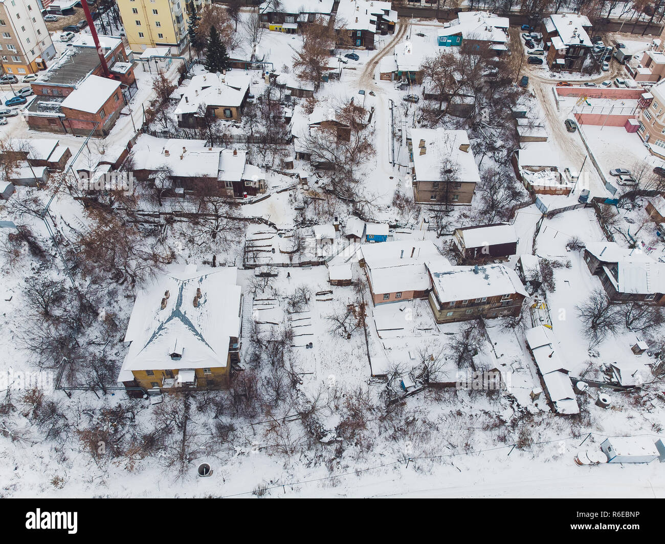 Snow covered city town and village houses in daylight with fresh snow ...