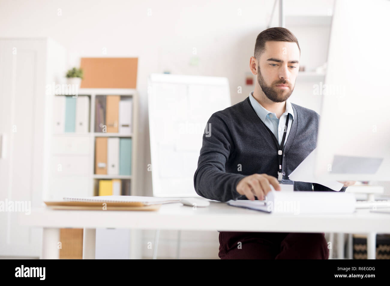 Man Using Computer in Office Stock Photo - Alamy