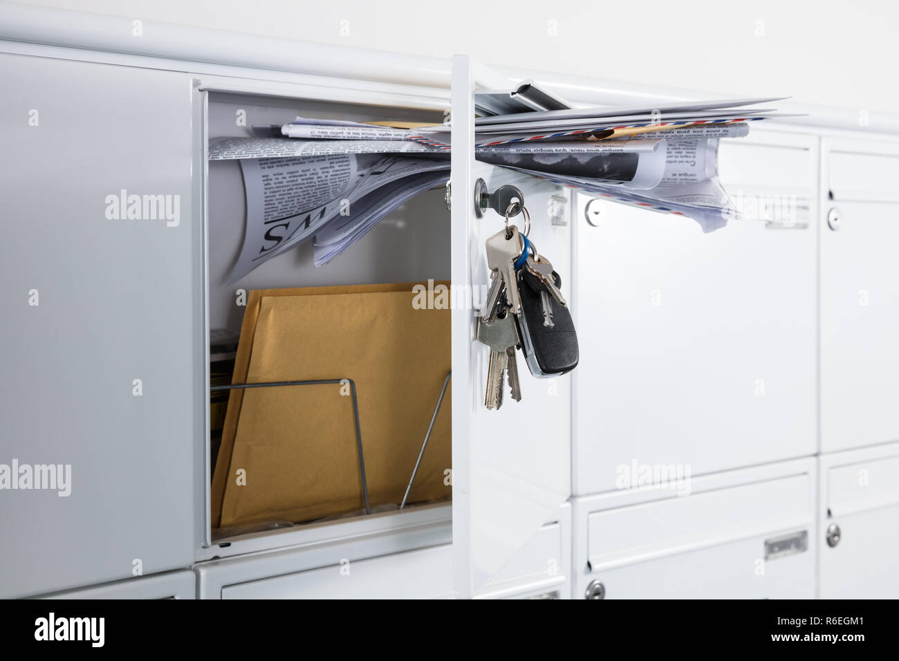 Open Mailbox With Newspapers And Letters Stock Photo - Alamy