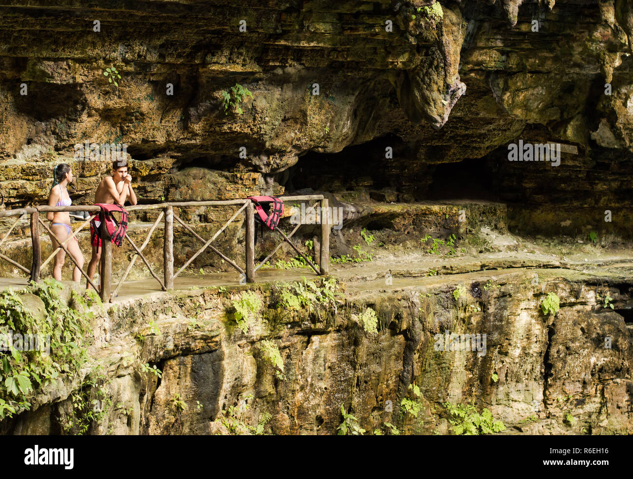 Young tourists at a Cenote in Valladolid, Yucatan, Mexico Stock Photo ...