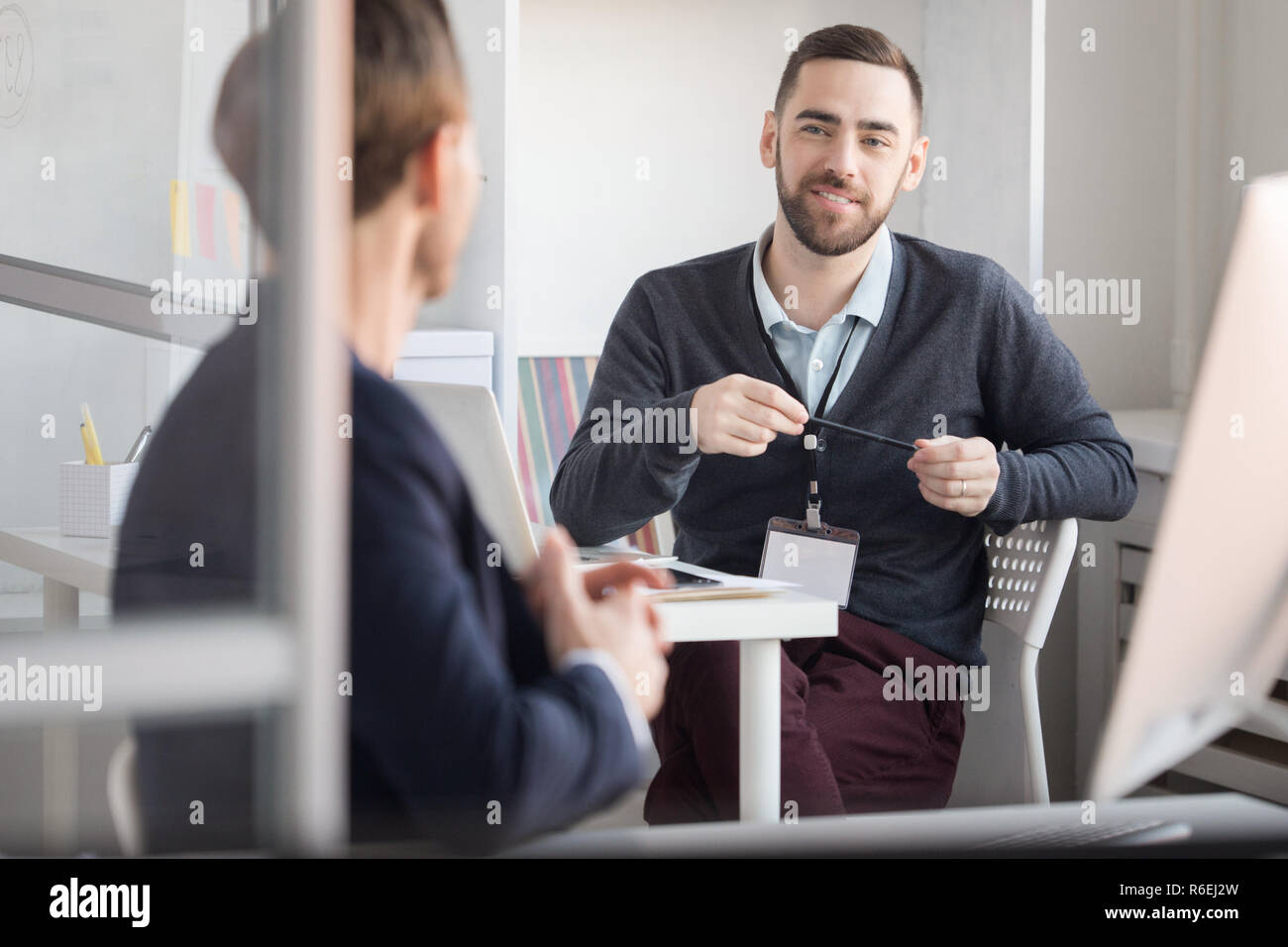 Colleagues talking hi-res stock photography and images - Alamy
