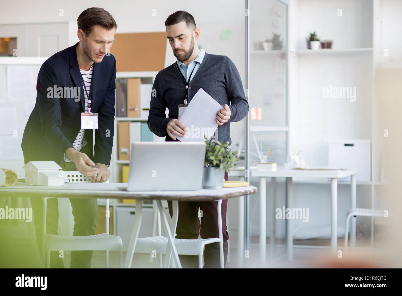 Two businessmen collaborating in hi-res stock photography and images ...
