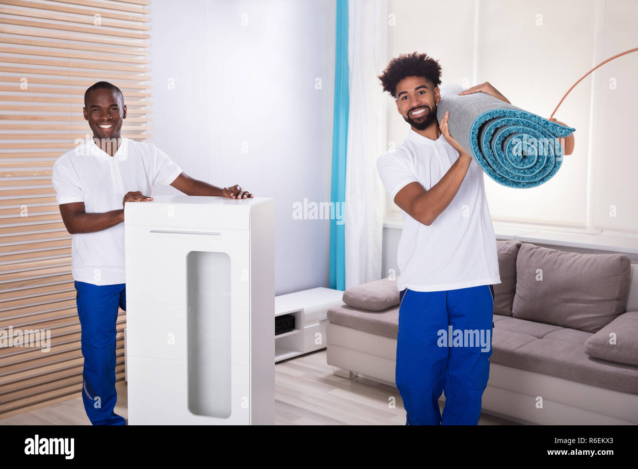 Portrait Of Two Male Movers Stock Photo - Alamy