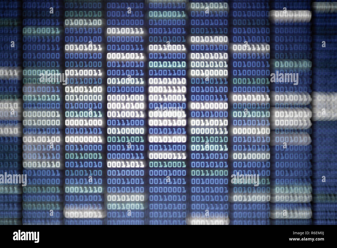 binary code on display screen. white blue light green colors number one ...