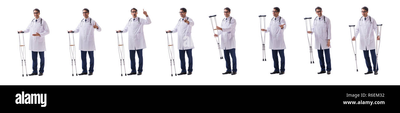 Young doctor physician standing walking isolated on white background ...