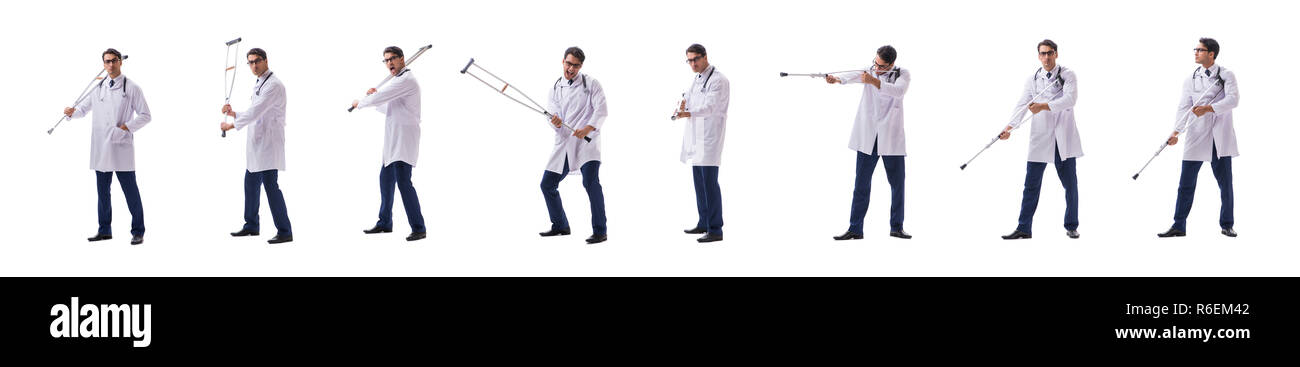 Young doctor physician standing walking isolated on white background ...