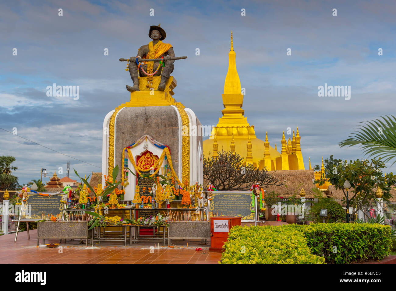Statue Of King Setthathirat With Pha That Luang In The Background ...