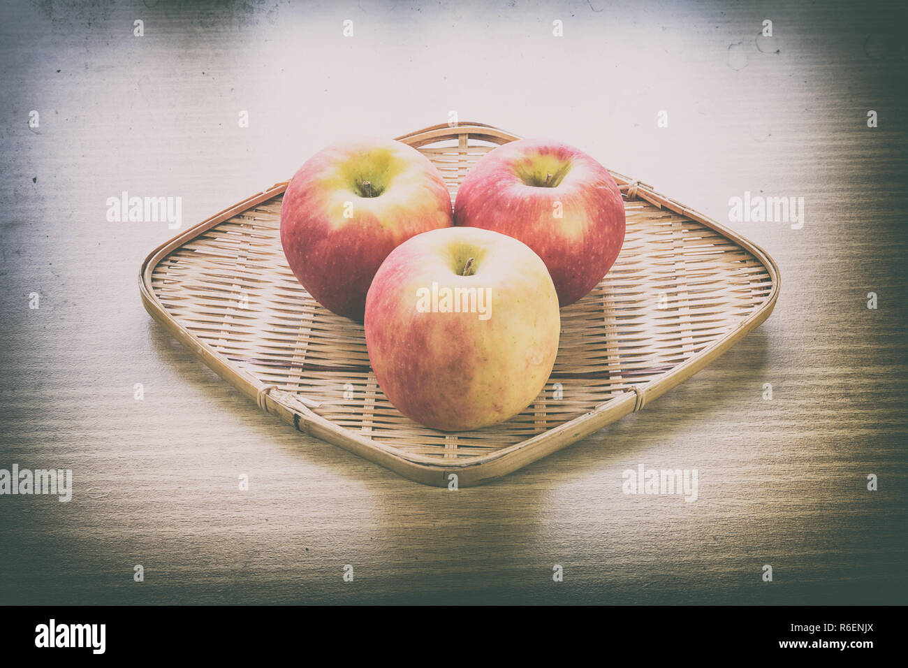 Red apple in basket Stock Photo - Alamy
