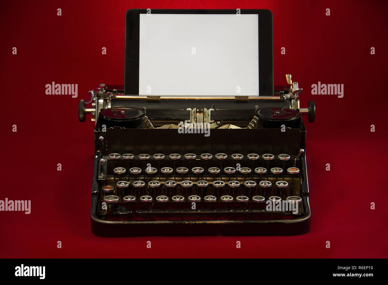 nostalgic typewriter with tablet Stock Photo - Alamy