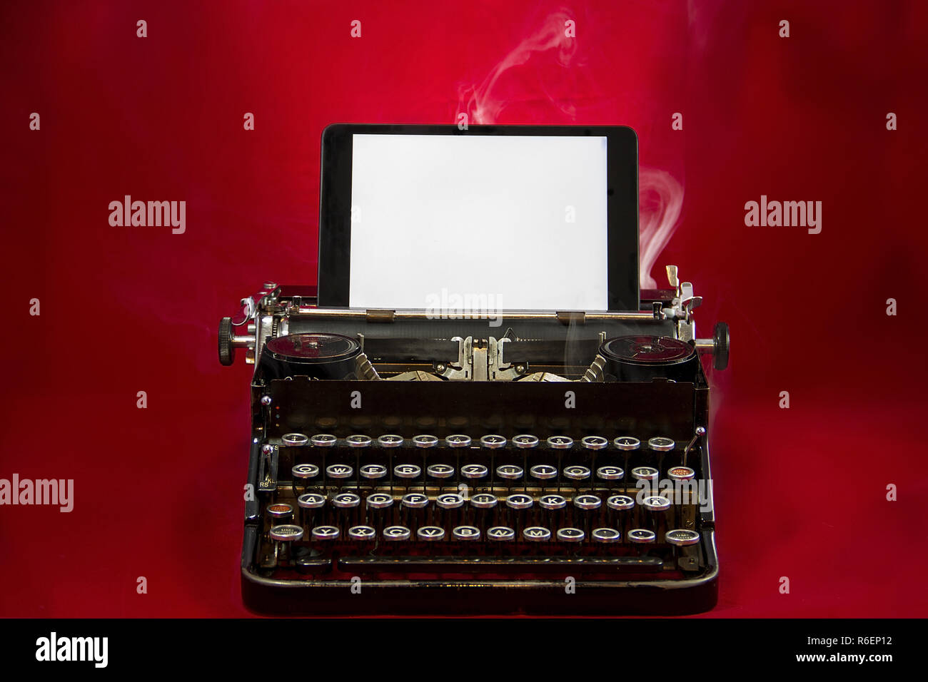 nostalgic typewriter with tablet Stock Photo - Alamy