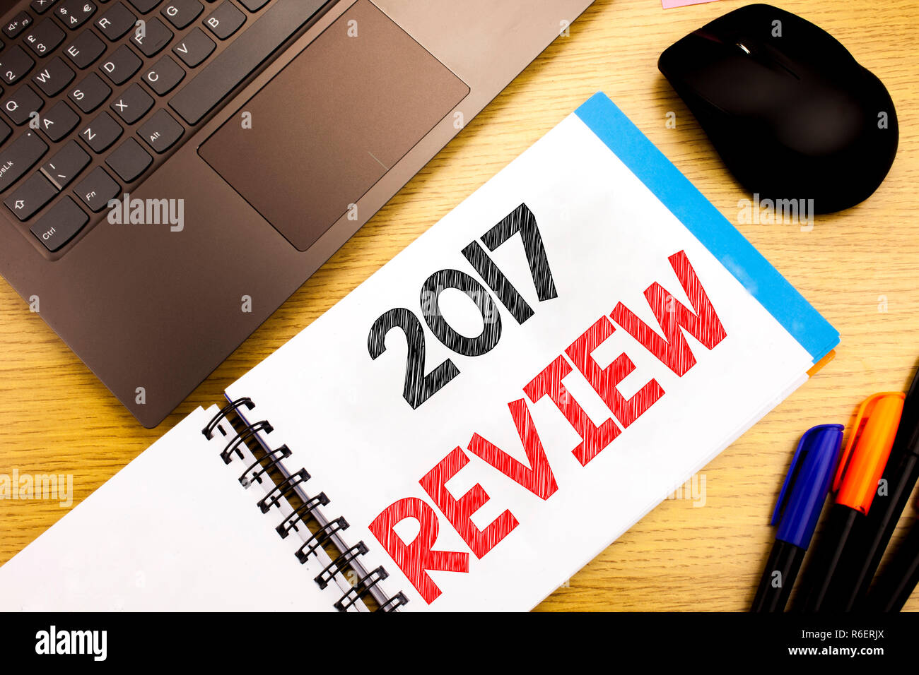 Handwritten text caption showing 2017 Review. Business concept writing ...