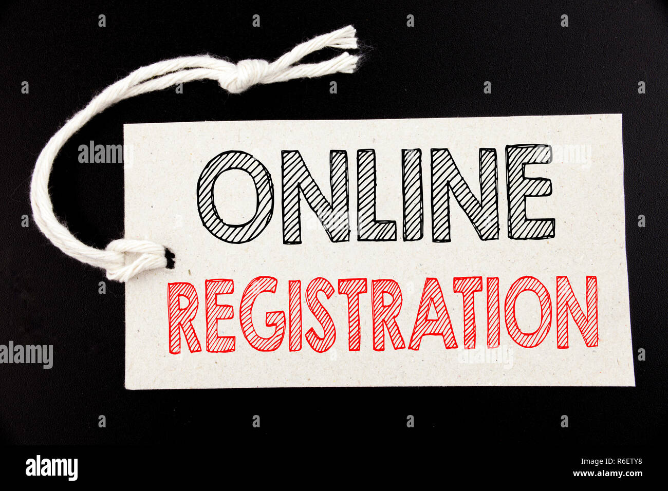 Handwritten text caption showing Online Registration. Business concept ...