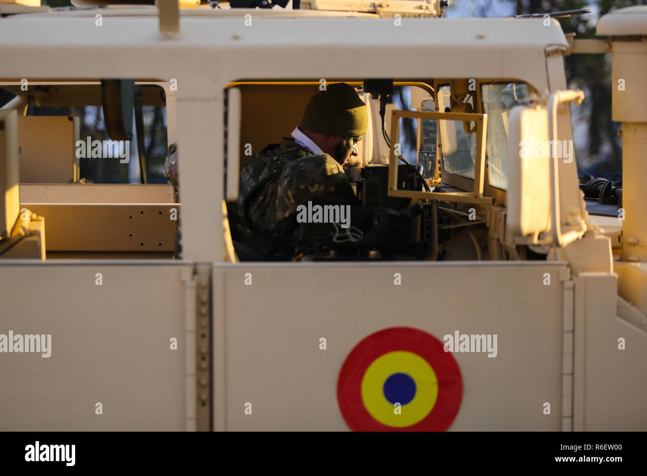BUCHAREST, ROMANIA - December 1, 2018: Romanian soldier in a Humvee ...