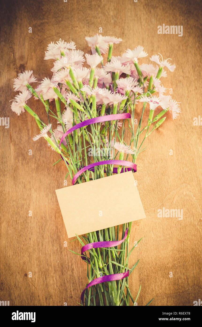 Tender flowers and empty greeting card Stock Photo - Alamy