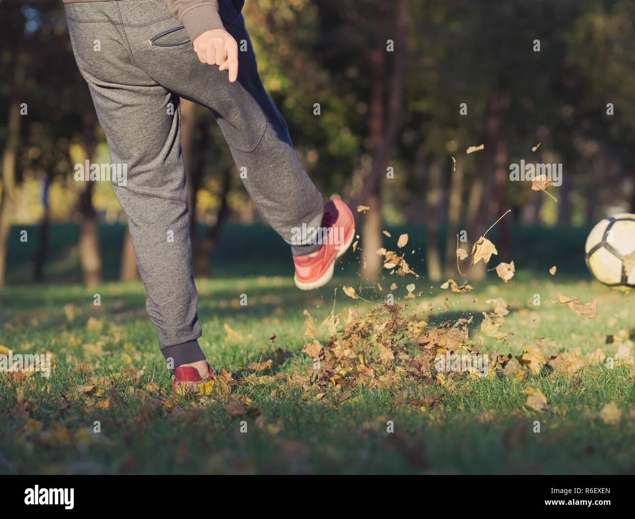 Soccer player kicking a ball hi-res stock photography and images - Alamy