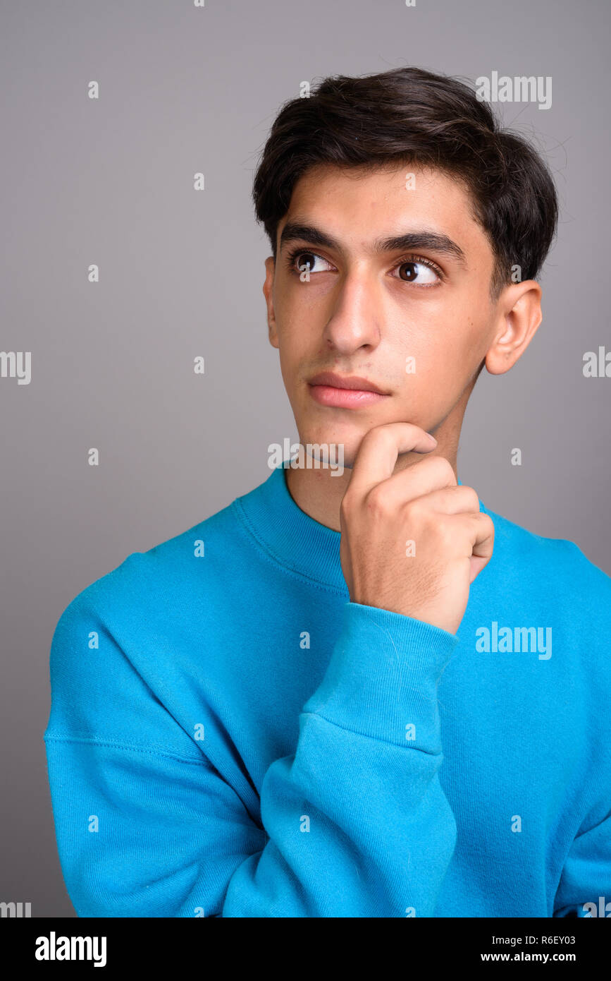 Boy with his hand to his head hi-res stock photography and images - Alamy