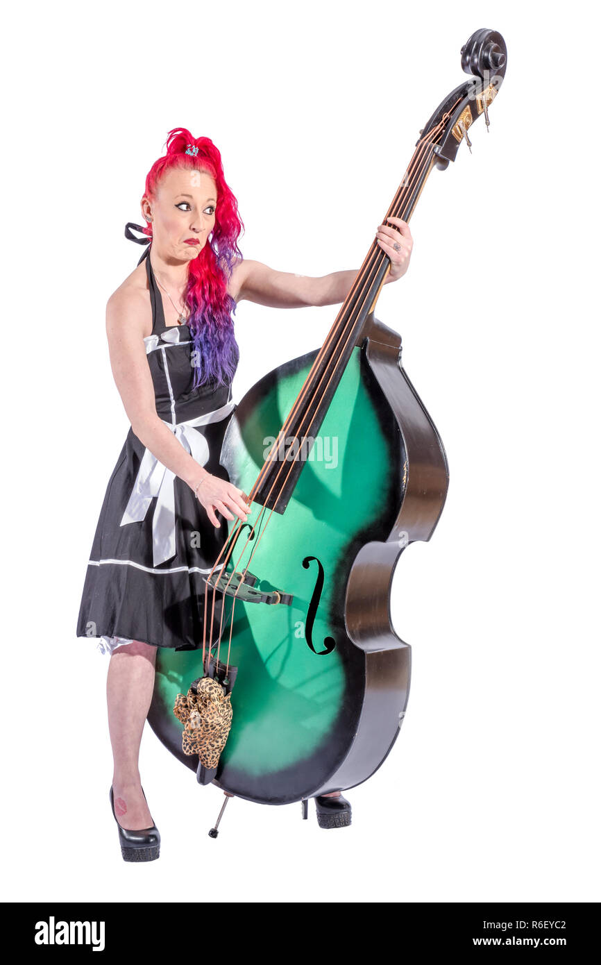 rock'n'roll singer with red hair,double bass and microphone Stock Photo ...