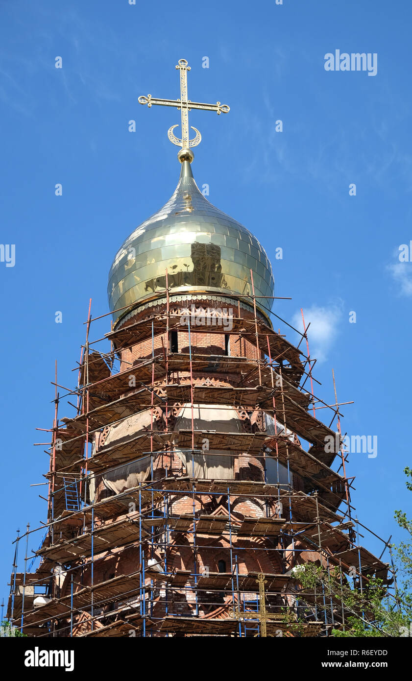 Russian christian church building construction in process. Vertical ...