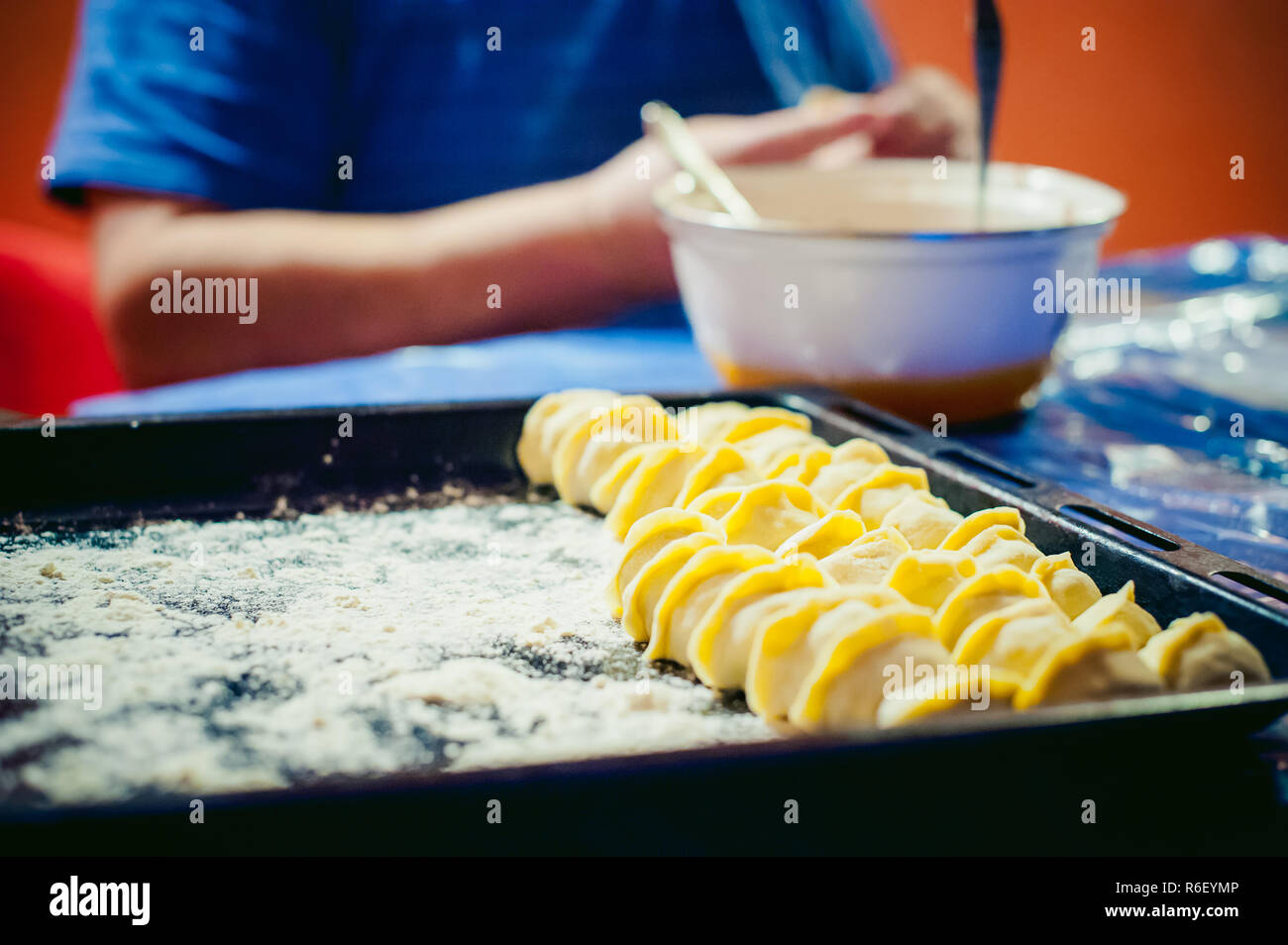 hand modeling dumplings at home in the kitchen Stock Photo - Alamy
