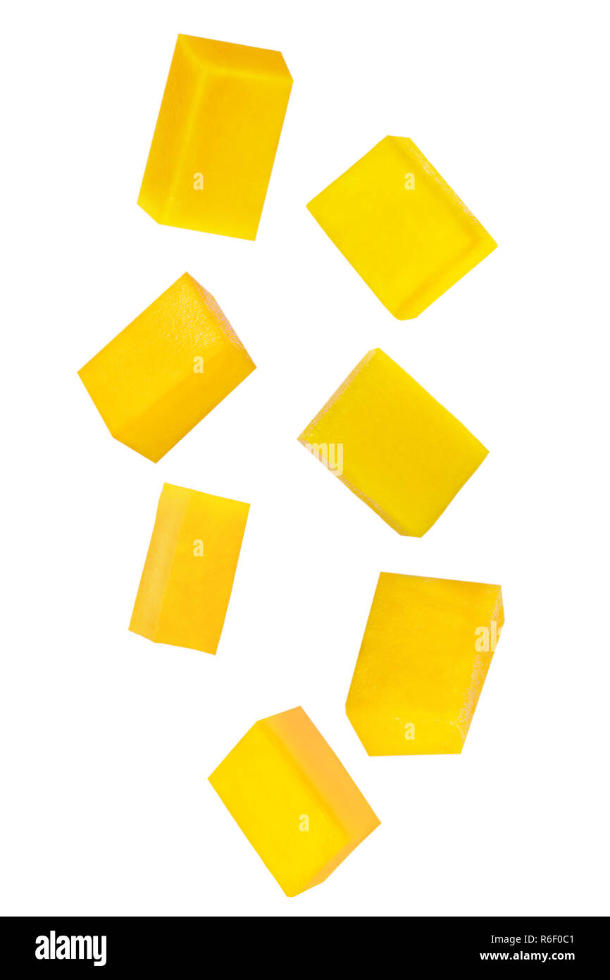 Falling sliced mango isolated on white Stock Photo - Alamy