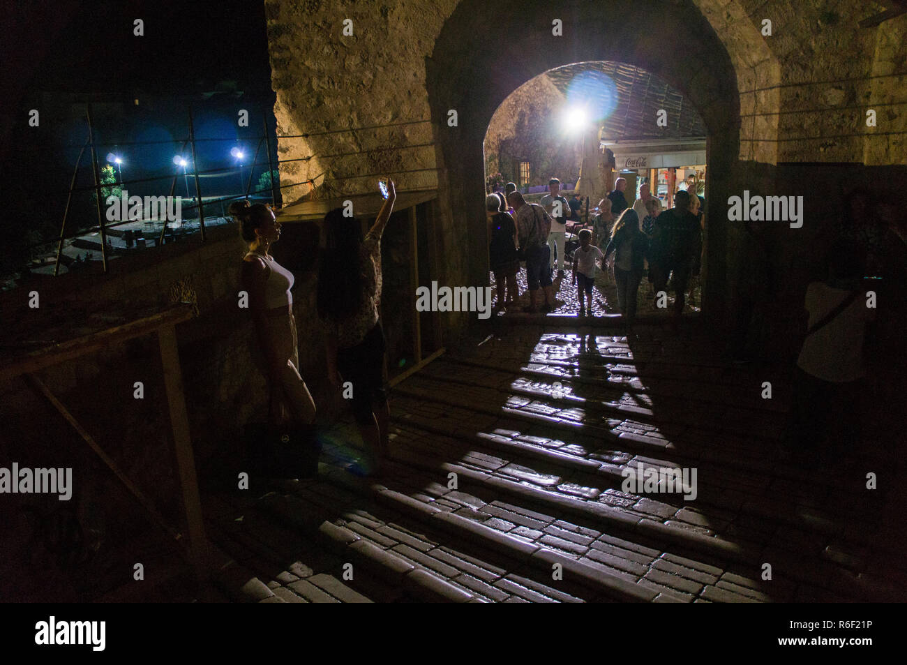A night view of the historical Stari Most, an arch Old Bridge build in ...