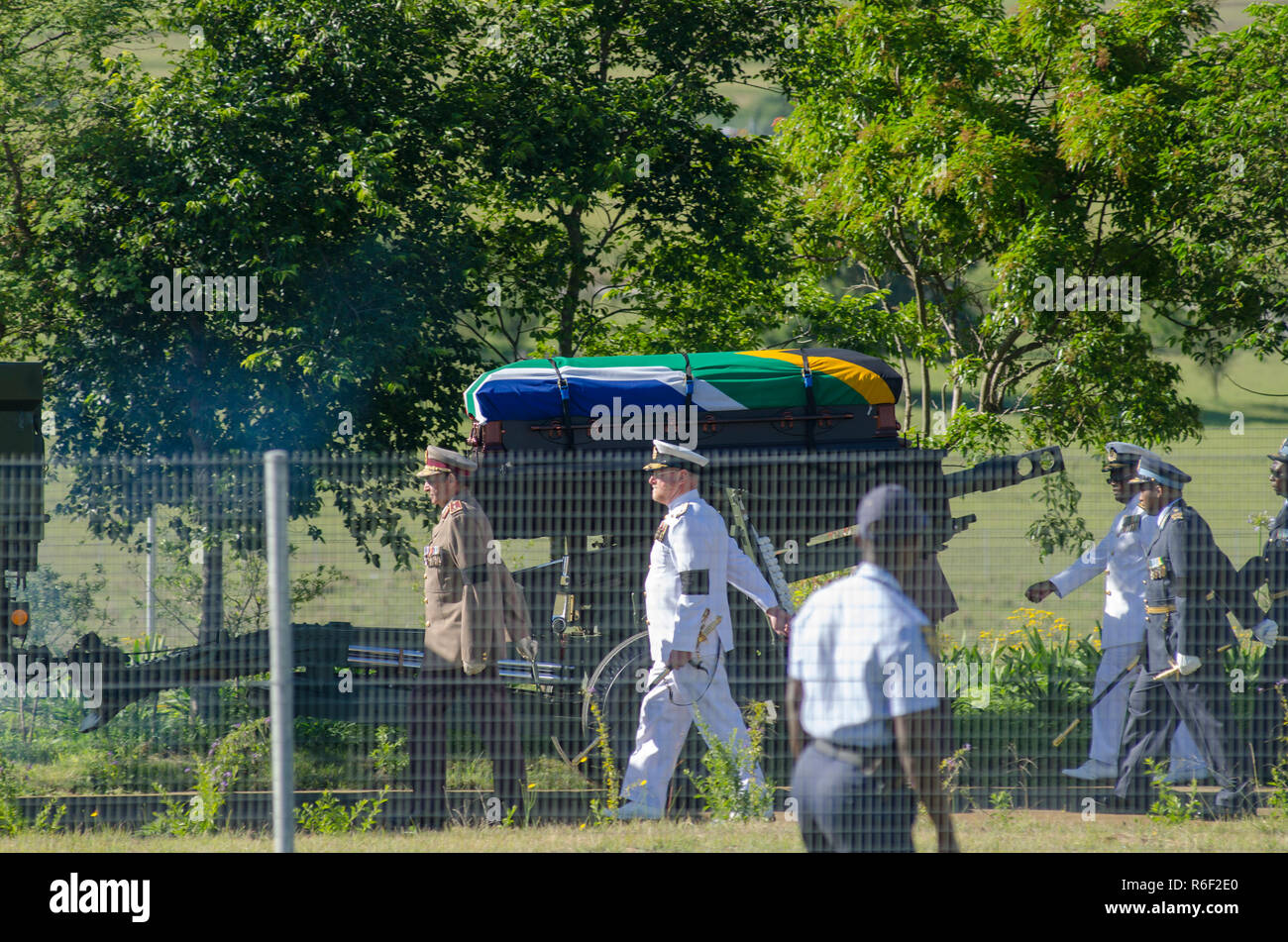 The coffin carrying former President Nelson Mandela arrives for his ...
