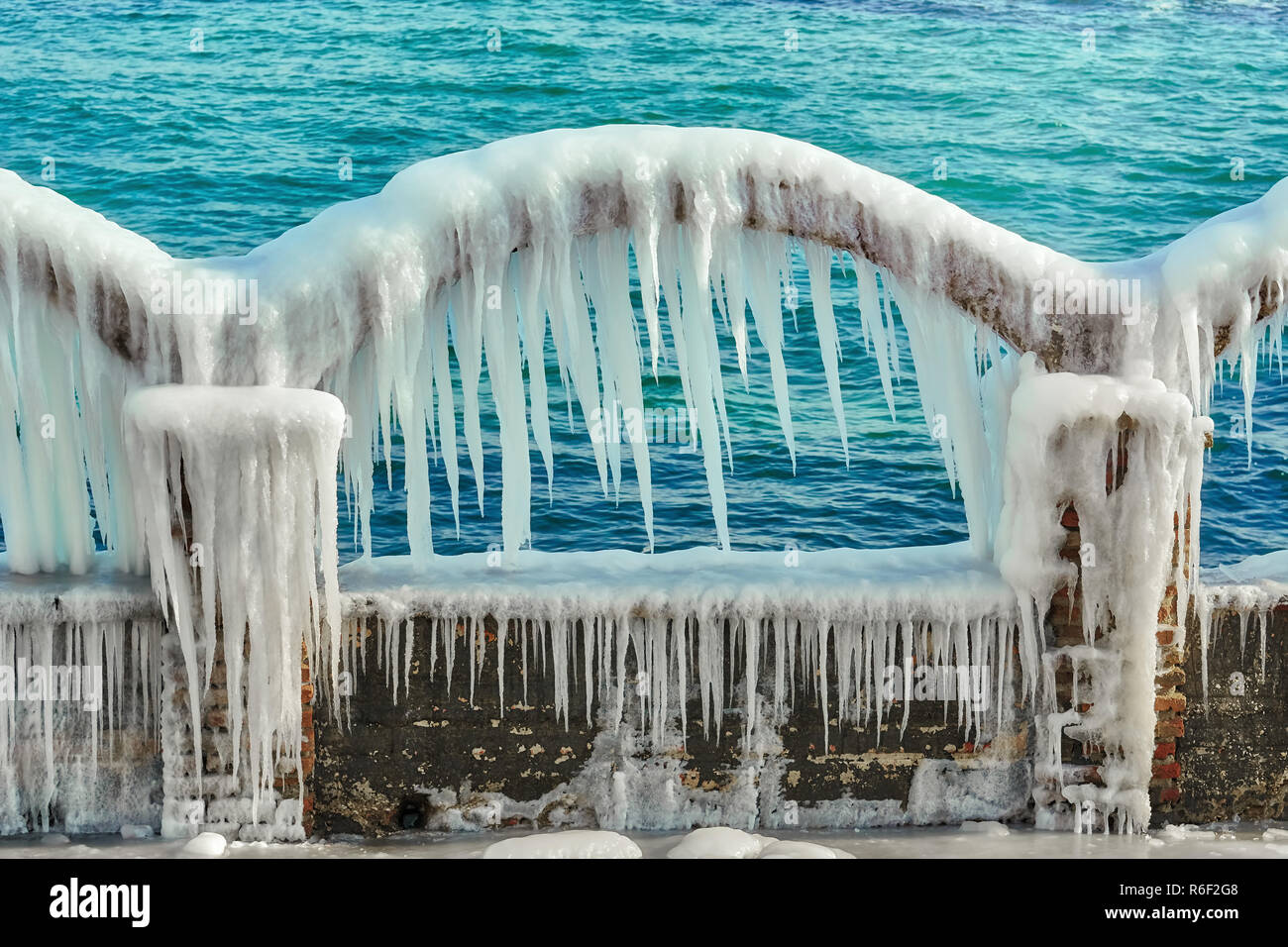 Icy Arch with Icicles Stock Photo - Alamy