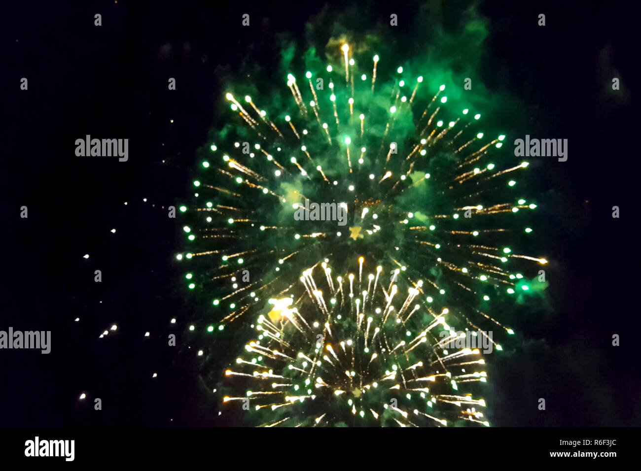 Festive salute in the night sky. Explosions of fireworks Stock Photo ...