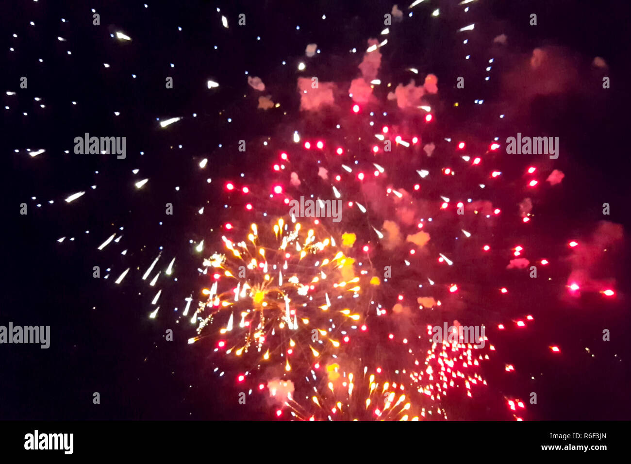 Festive salute in the night sky. Explosions of fireworks Stock Photo ...