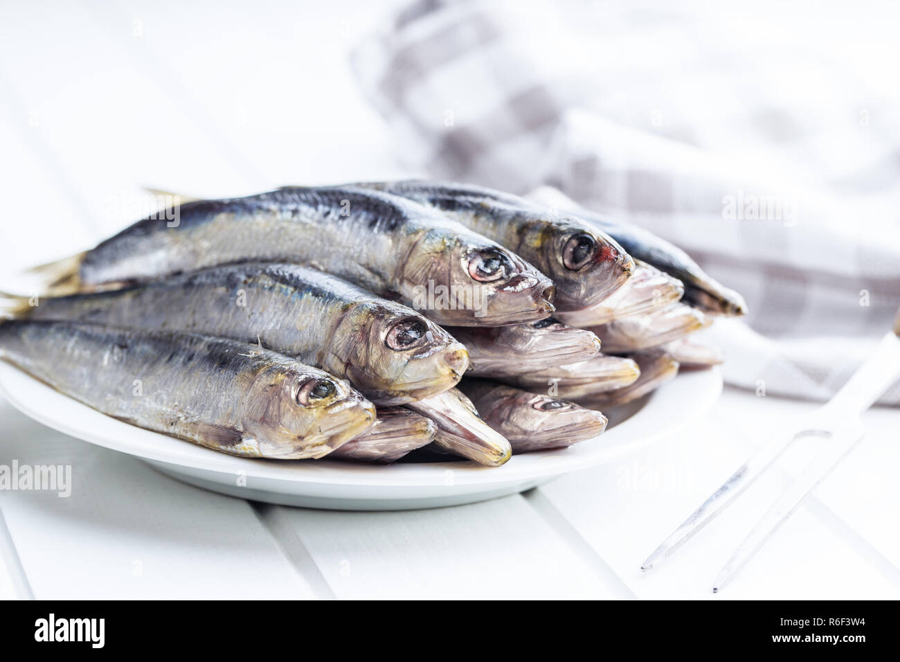 Raw sardines fish Stock Photo - Alamy
