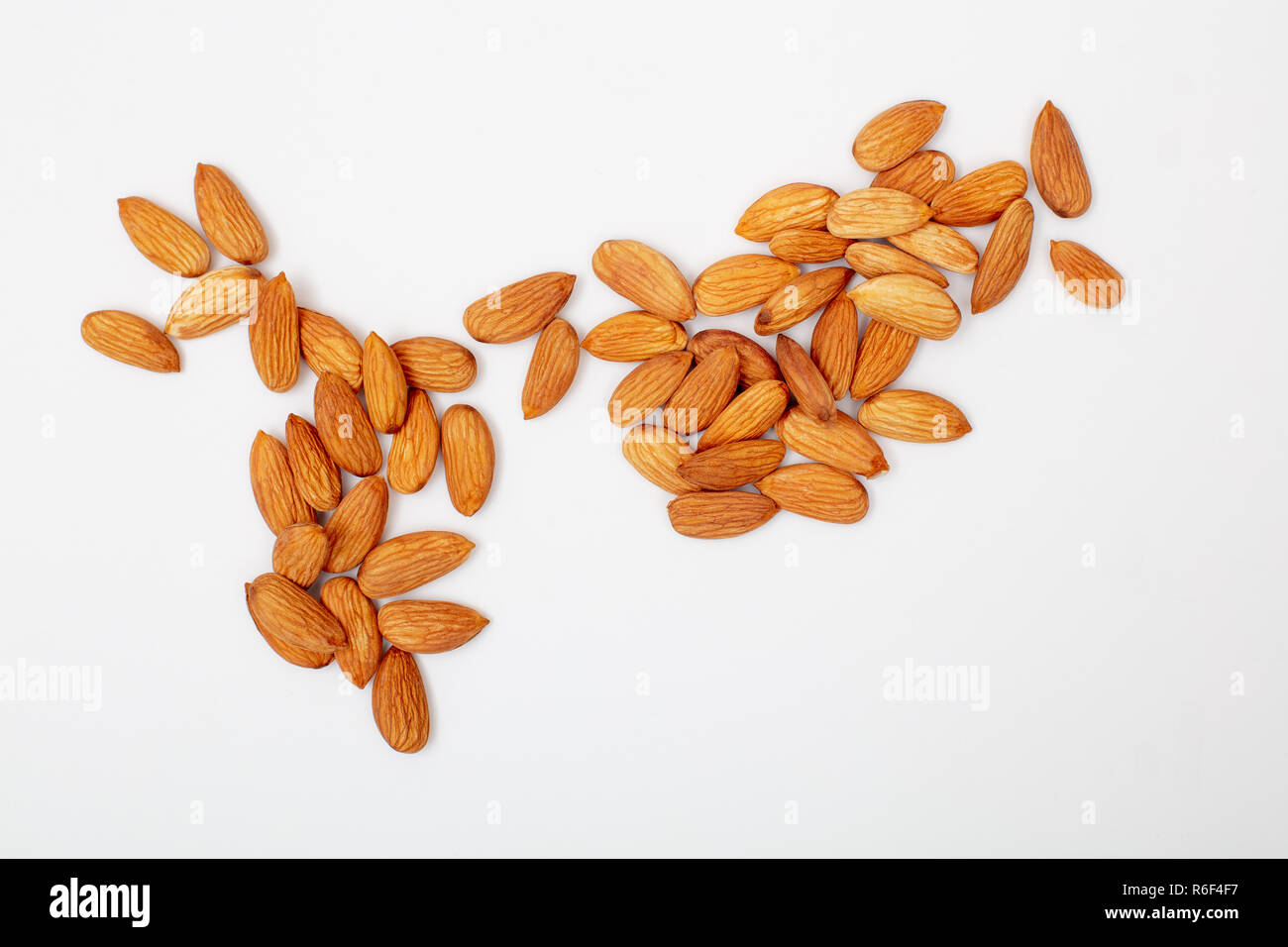Almonds, Pattern of nuts form. isolated on white background, top view ...