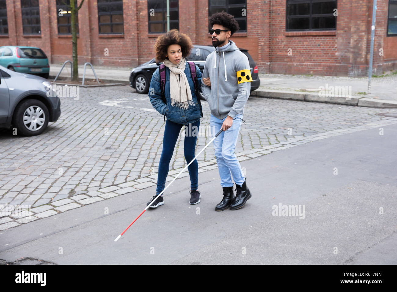 Thief Stealing Purse From Backpack Stock Photo - Alamy