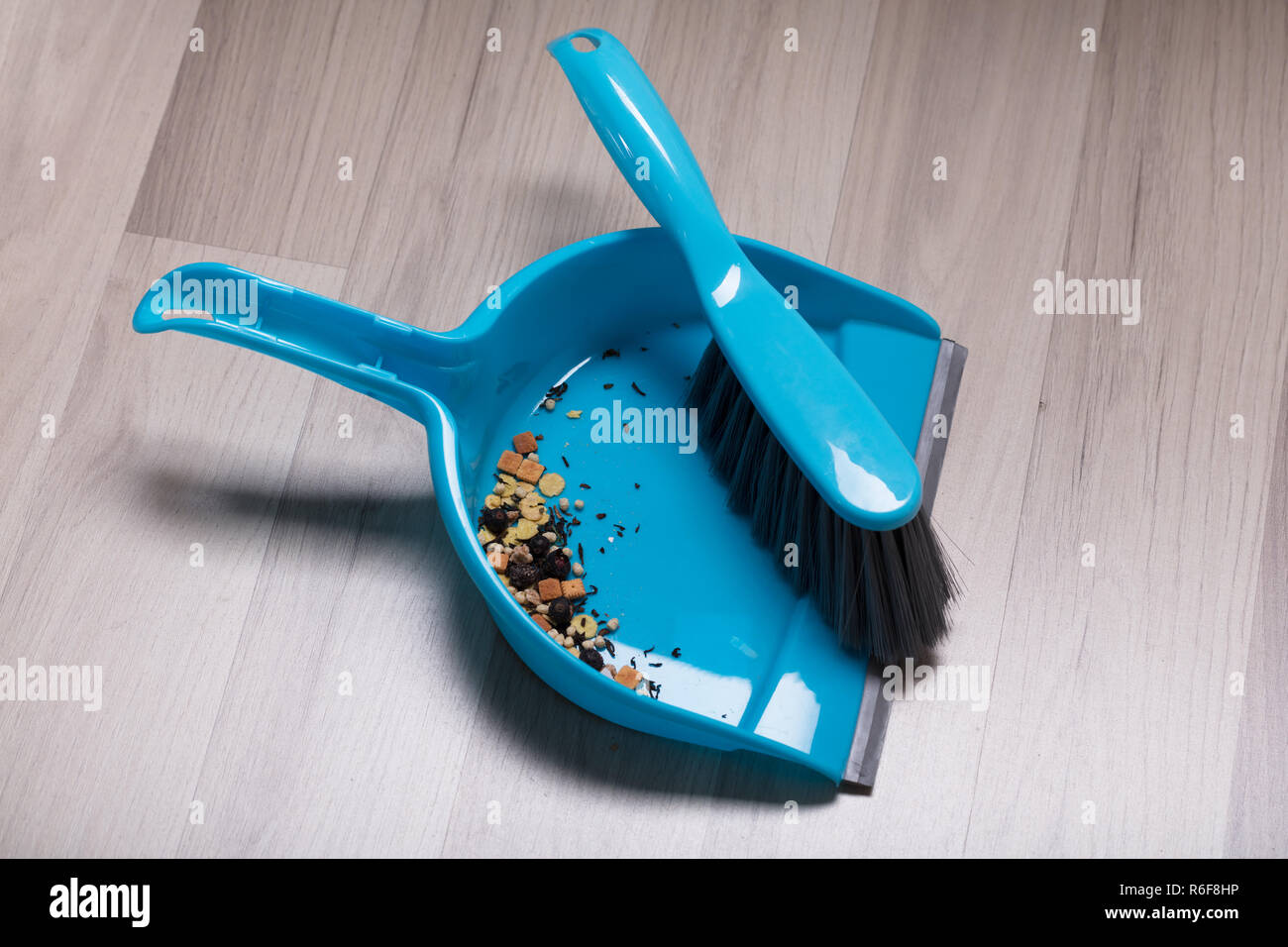Dirt On Plastic Sweeping Dust Pan And Brush Stock Photo - Alamy
