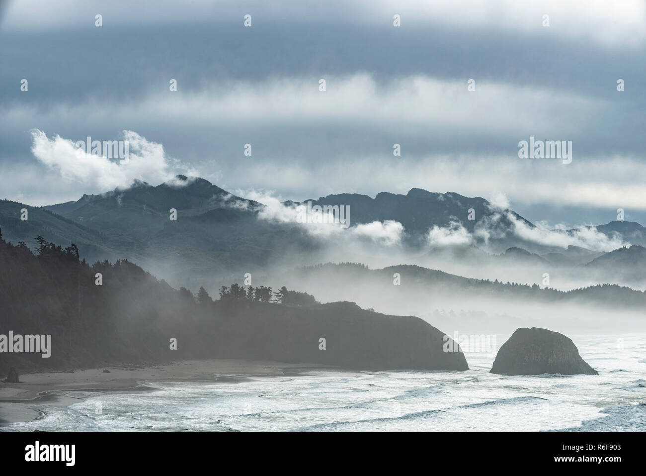 Heavy fog, Ecola State Park, as seen from Cannon Beach, Oregon, USA, by ...
