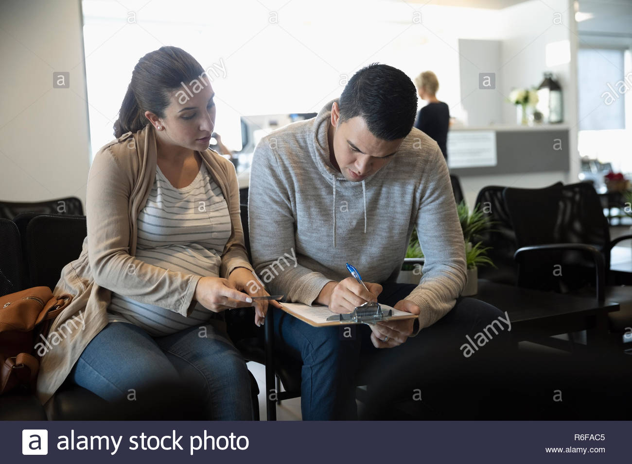 Pregnant asian couple in front High Resolution Stock Photography and ...