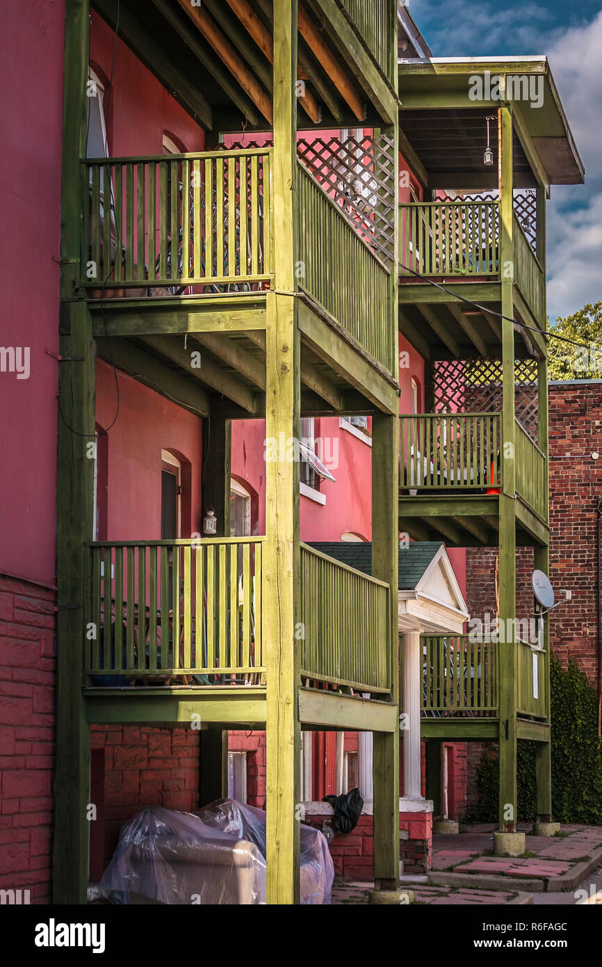 Side view of wooden balconies of an apartment building Stock Photo - Alamy
