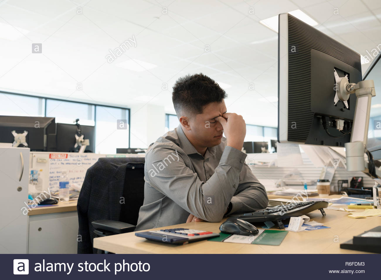 Asian men tired hi-res stock photography and images - Alamy