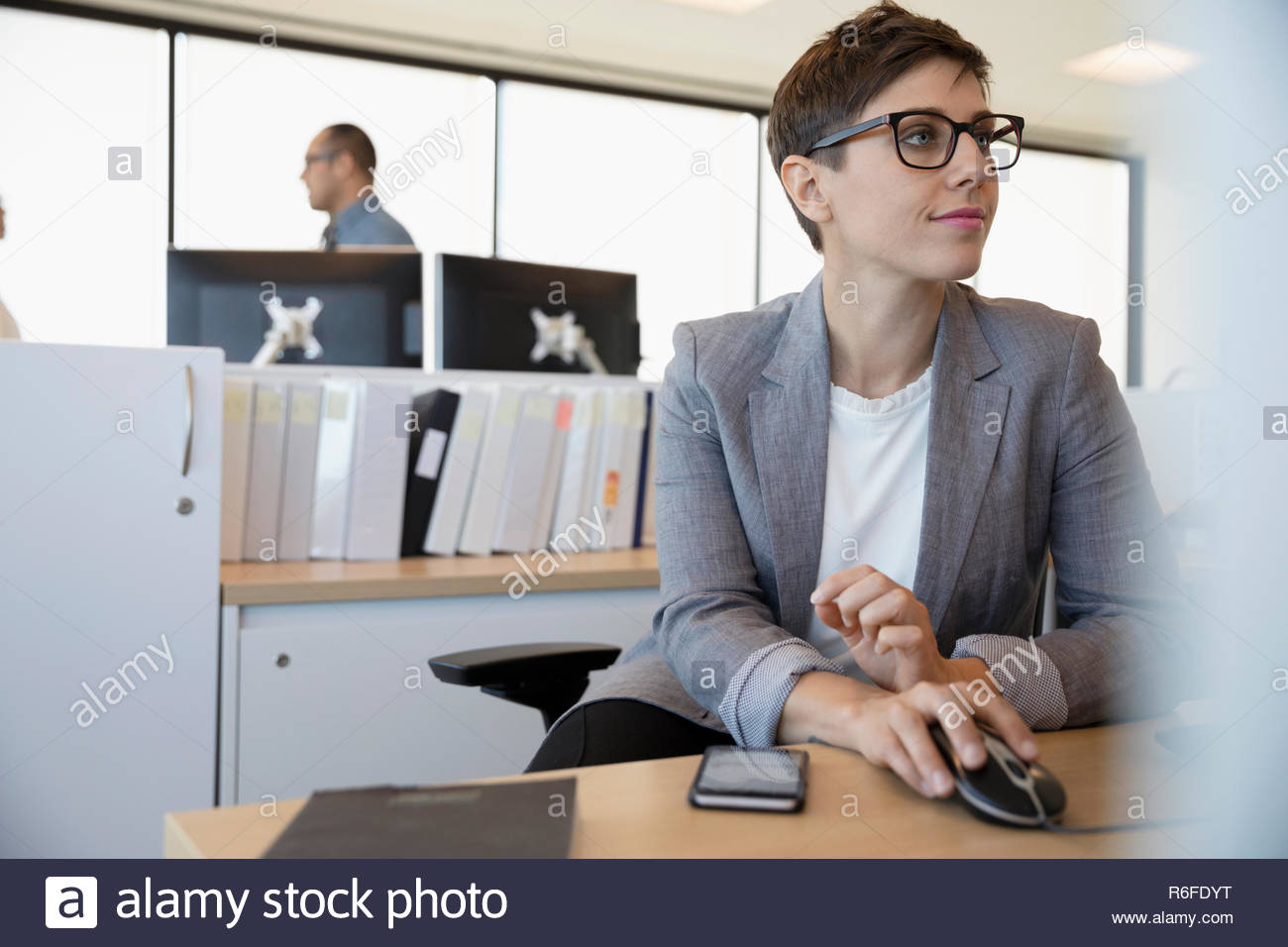 Working in office cubicle hi-res stock photography and images - Alamy
